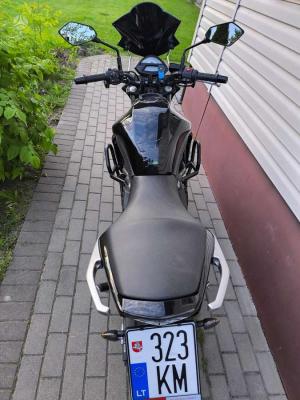 Black Kawasaki ER 2009 in Vilnius, with an engine capacity of 0.65 L and mileage of 52 thousand km for 3000 €, photo 7 on AUTOMOTO.COM.LV