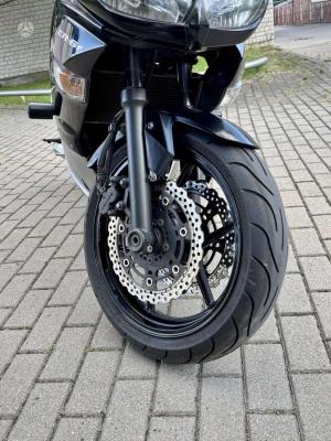 Black Kawasaki ER 2010 in Vilnius, with an engine capacity of 0.65 L and mileage of 81 thousand km for 2500 €, photo 11 on AUTOMOTO.COM.LV