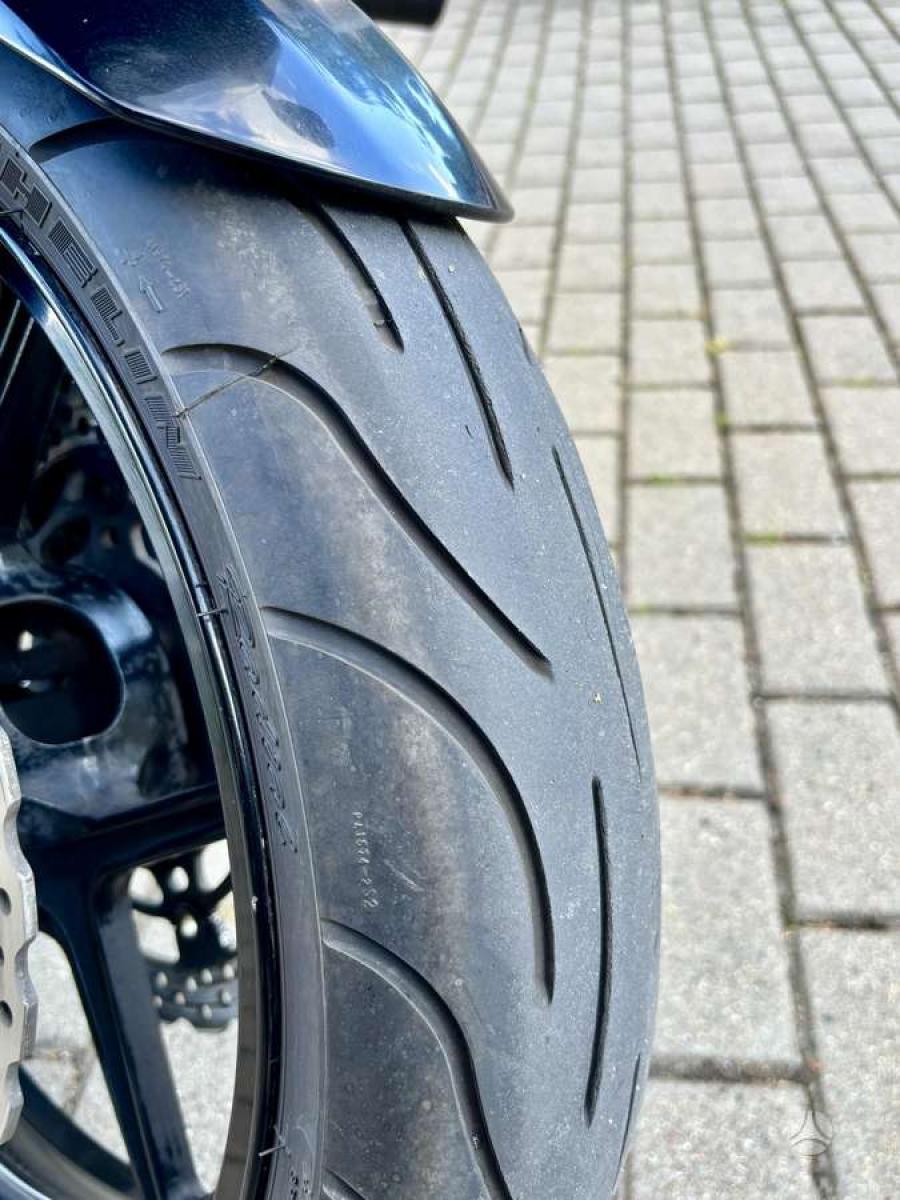 Black Kawasaki ER 2010 in Vilnius, with an engine capacity of 0.65 L and mileage of 81 thousand km for 2500 €, photo 12 on AUTOMOTO.COM.LV