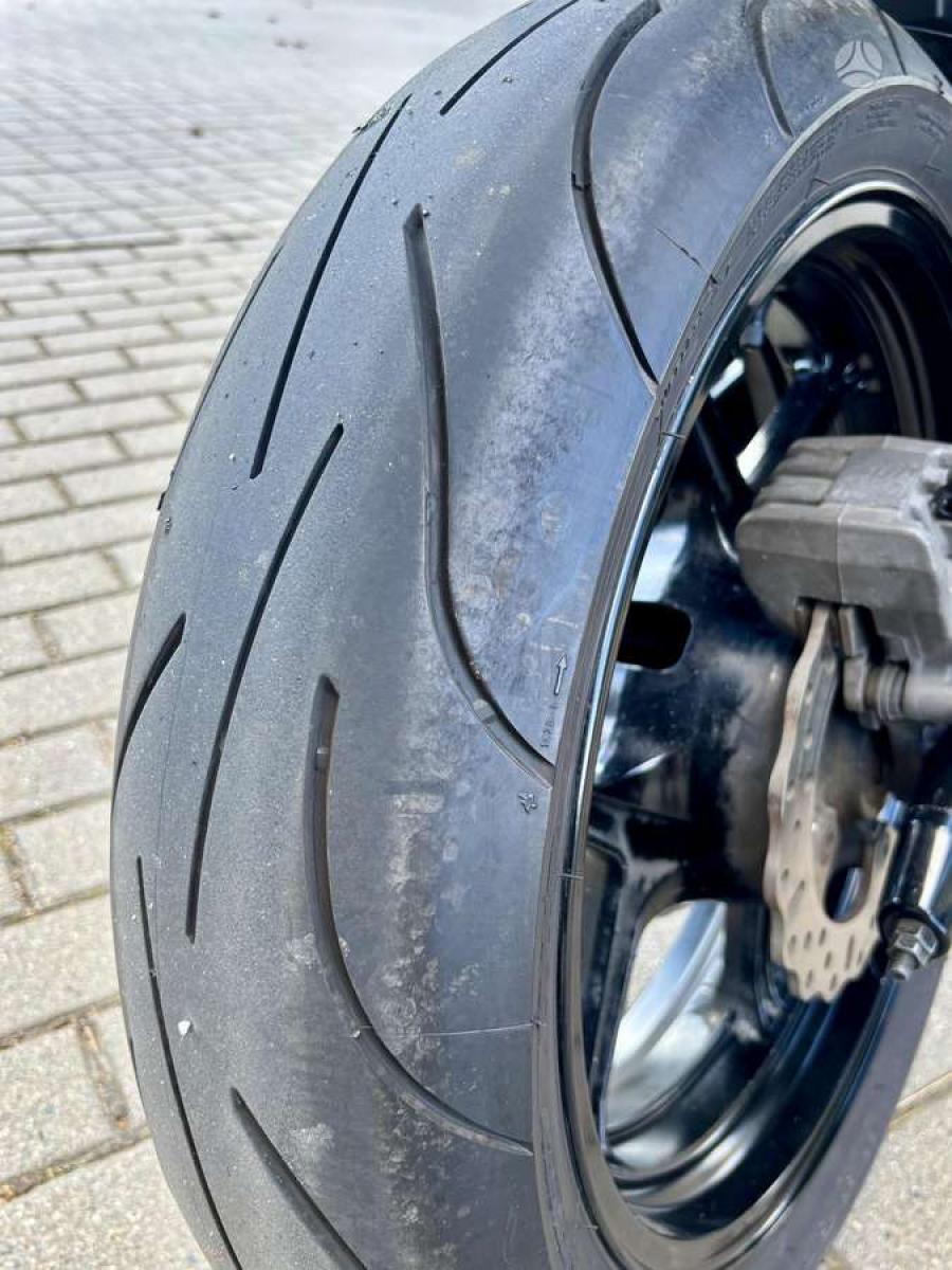 Black Kawasaki ER 2010 in Vilnius, with an engine capacity of 0.65 L and mileage of 81 thousand km for 2500 €, photo 13 on AUTOMOTO.COM.LV