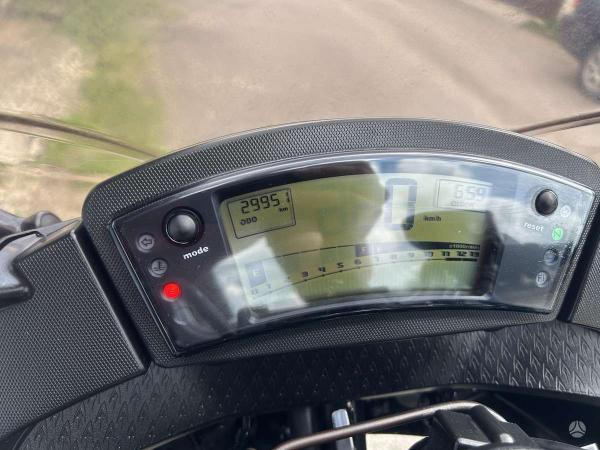 Black Kawasaki ER 2010 in Birstonas, with an engine capacity of 0.65 L and mileage of 30 thousand km for 2999 €, photo 8 on AUTOMOTO.COM.LV
