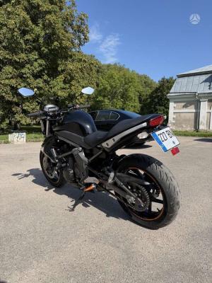 Black Kawasaki ER 2010 in Vilnius, with an engine capacity of 0.65 L and mileage of 26 thousand km for 3000 €, photo 7 on AUTOMOTO.COM.LV
