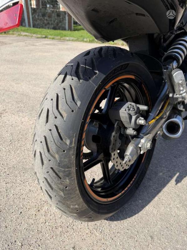 Melns Kawasaki ER 2010 Viļņa, ar dzinēja tilpumu 0.65 L un nobraukumu 26 tūkst. km par 3000 €, foto 8 vietnē AUTOMOTO.COM.LV