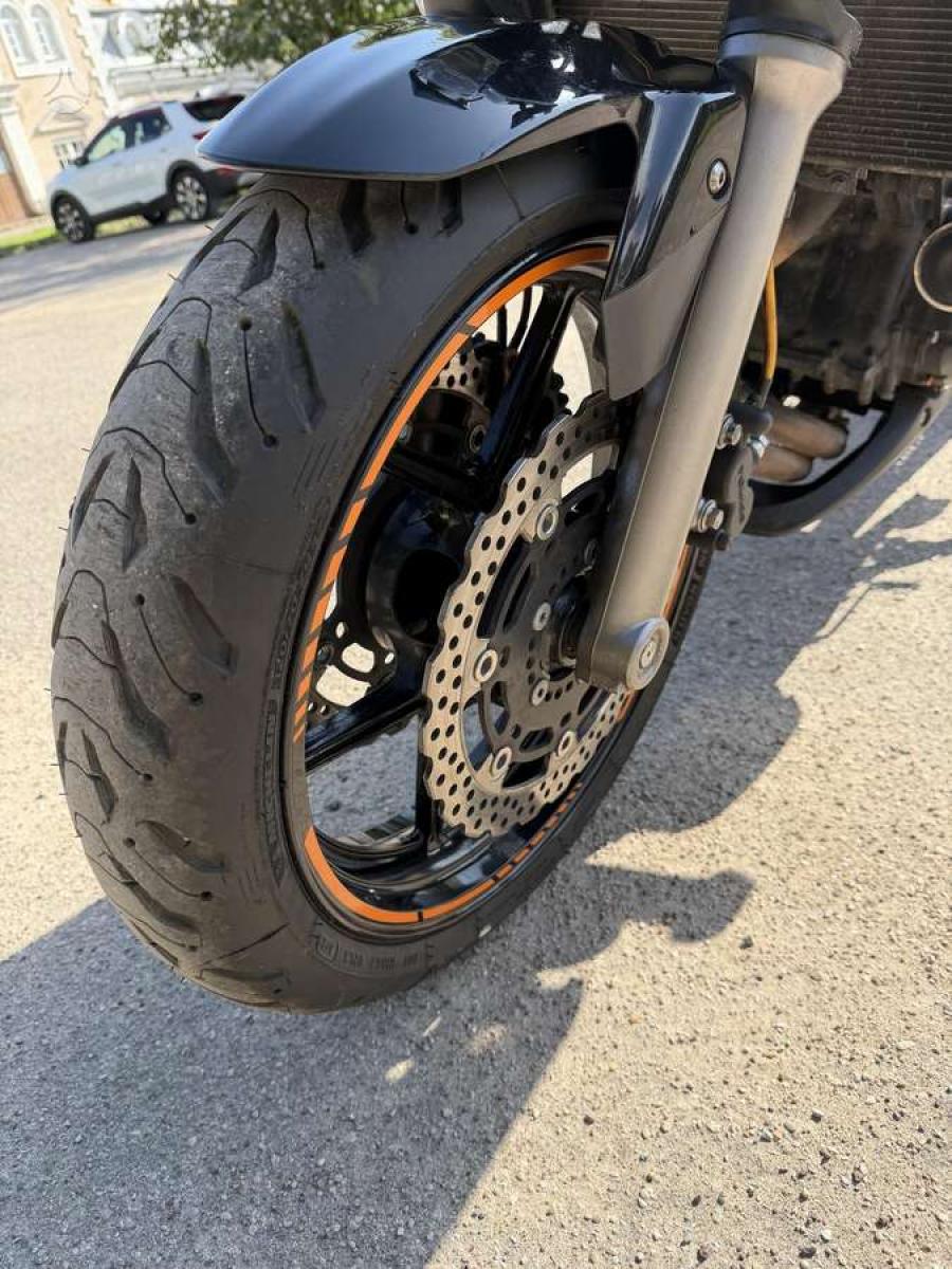 Black Kawasaki ER 2010 in Vilnius, with an engine capacity of 0.65 L and mileage of 26 thousand km for 3000 €, photo 9 on AUTOMOTO.COM.LV