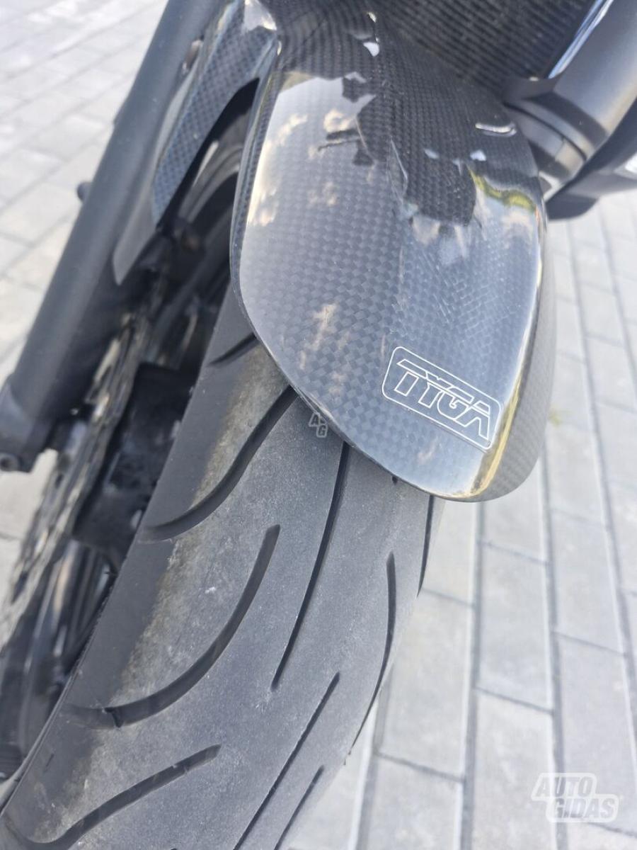 Black Kawasaki ER 2011 in Kaunas, with an engine capacity of 0.65 L and mileage of 46 thousand km for 2700 €, photo 13 on AUTOMOTO.COM.LV