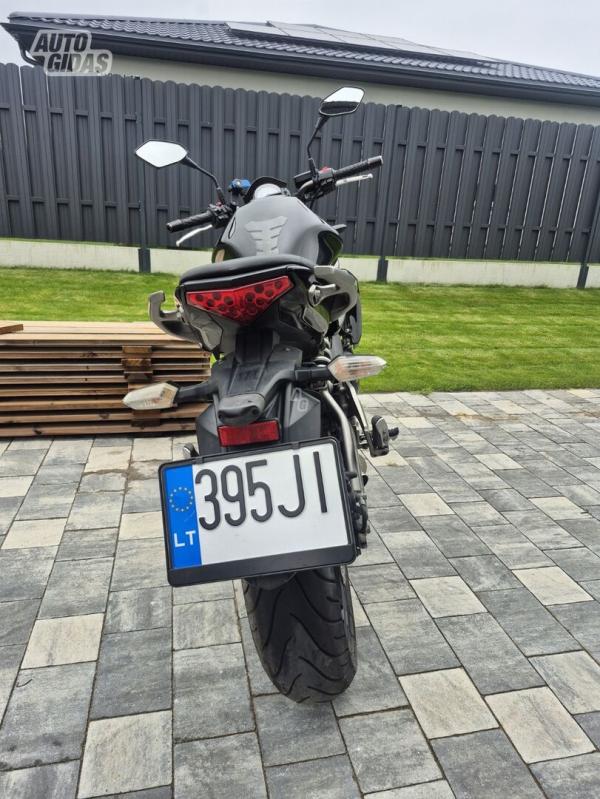 Black Kawasaki ER 2012 in Vilnius, with an engine capacity of 0.65 L and mileage of 35 thousand km for 3333 €, photo 4 on AUTOMOTO.COM.LV