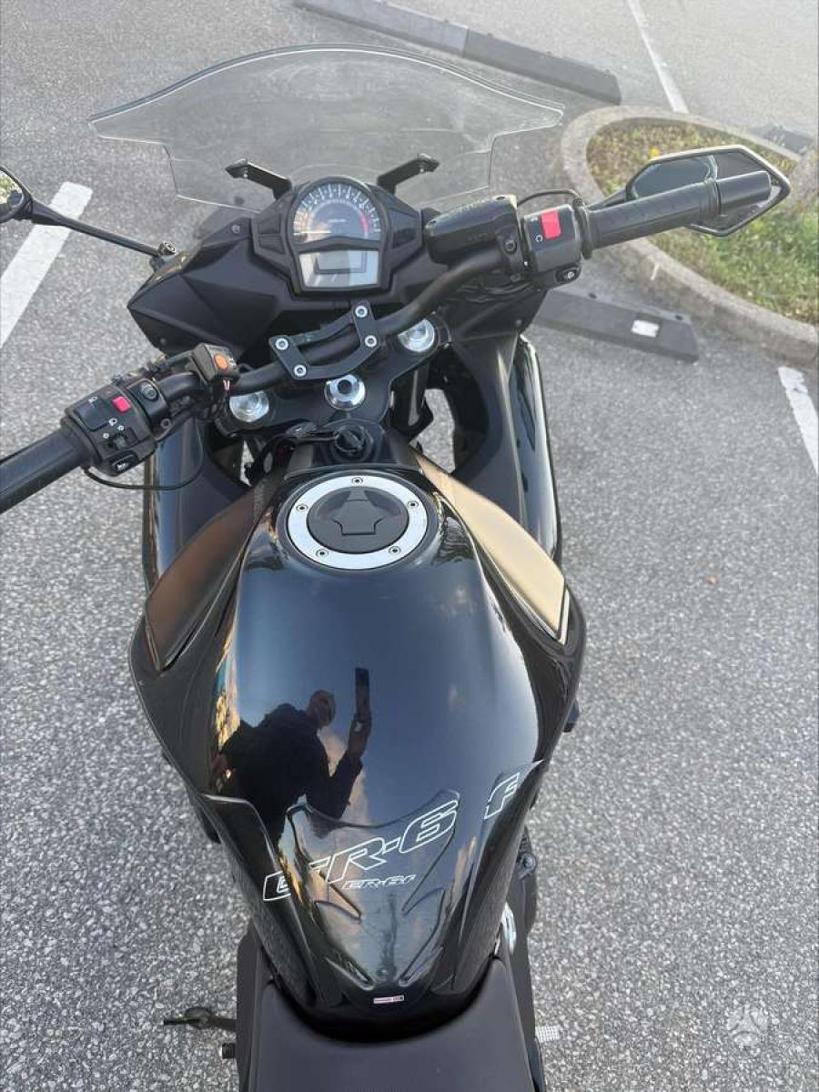 Black Kawasaki ER 2013 in Klaipeda, with an engine capacity of 0.65 L and mileage of 24 thousand km for 3900 €, photo 7 on AUTOMOTO.COM.LV