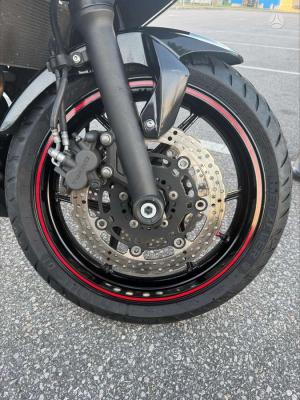 Black Kawasaki ER 2013 in Klaipeda, with an engine capacity of 0.65 L and mileage of 24 thousand km for 3900 €, photo 11 on AUTOMOTO.COM.LV