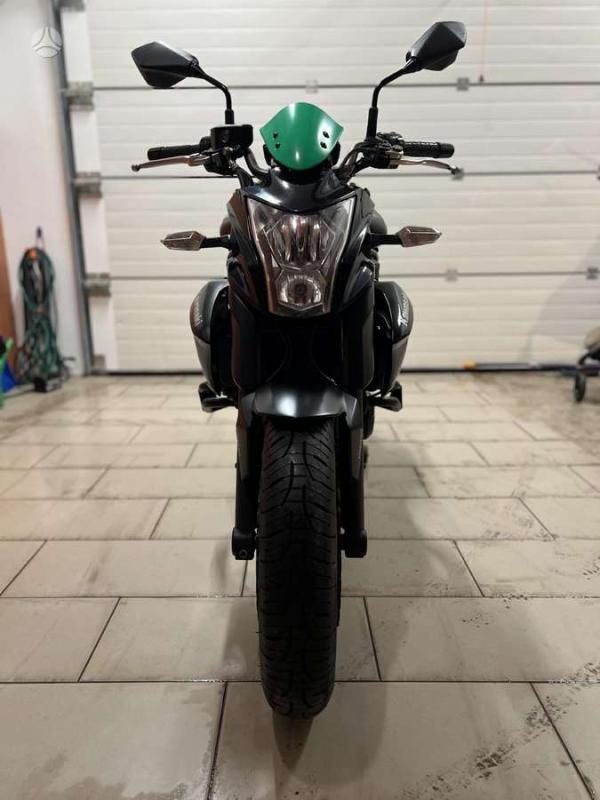 Black Kawasaki ER 2014 in Vilnius, with an engine capacity of 0.65 L and mileage of 42 thousand km for 3400 €, photo 7 on AUTOMOTO.COM.LV