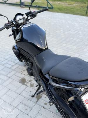 Melns Kawasaki ER 2014 Tauragė, ar dzinēja tilpumu 0.65 L un nobraukumu 32 tūkst. km par 3400 €, foto 8 vietnē AUTOMOTO.COM.LV