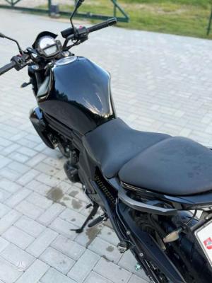 Black Kawasaki ER 2014 in Taurage, with an engine capacity of 0.65 L and mileage of 32 thousand km for 3200 €, photo 7 on AUTOMOTO.COM.LV