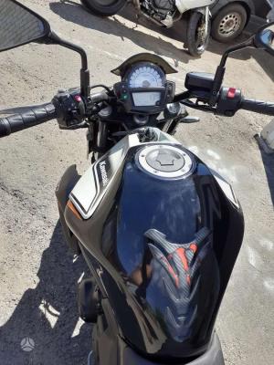 Black Kawasaki ER 2016 in Panevezys, with an engine capacity of 0.65 L and mileage of 45 thousand km for 3550 €, photo 12 on AUTOMOTO.COM.LV