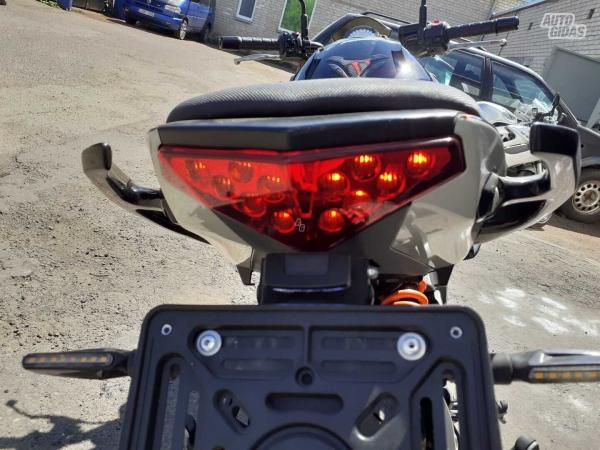 Black Kawasaki ER 2016 in Panevezys, with an engine capacity of 0.65 L and mileage of 45 thousand km for 3450 €, photo 7 on AUTOMOTO.COM.LV