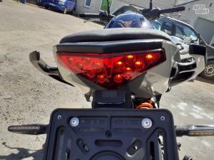 Black Kawasaki ER 2016 in Panevezys, with an engine capacity of 0.65 L and mileage of 45 thousand km for 3450 €, photo 8 on AUTOMOTO.COM.LV