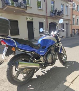 Blue Kawasaki ER 2000 in Vilnius, with an engine capacity of 0.50 L and mileage of 46 thousand km for 1000 €, photo 4 on AUTOMOTO.COM.LV