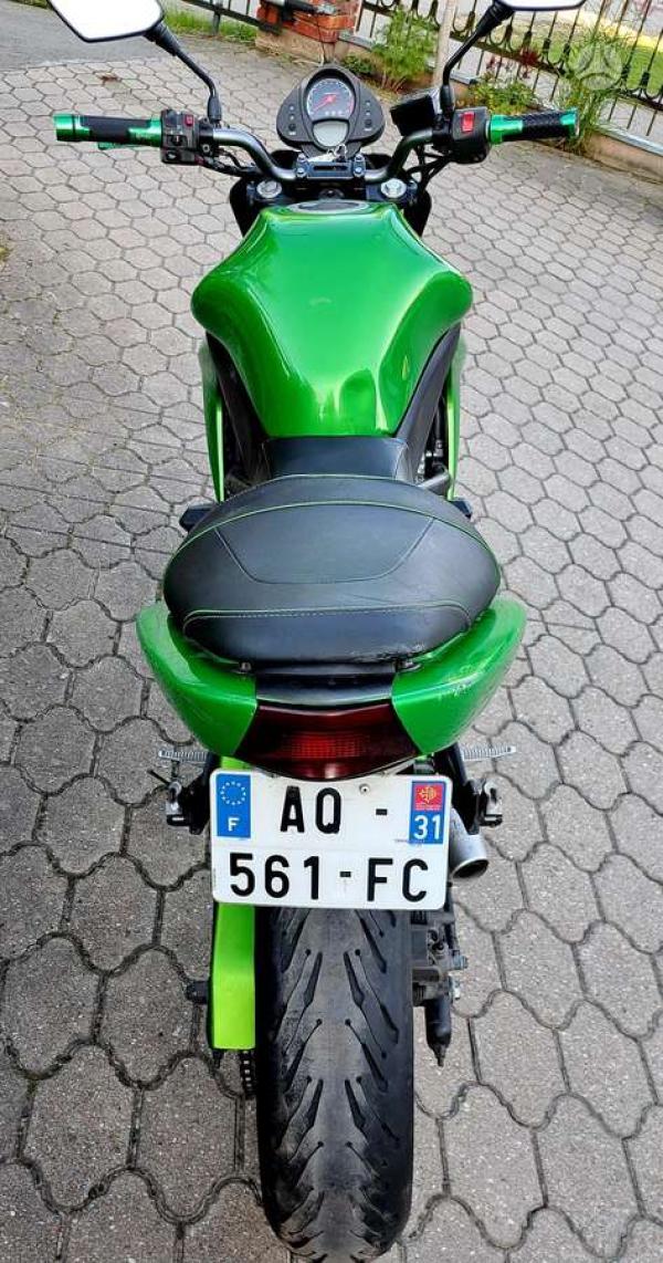 Green Kawasaki ER 2008 in Pasvalys, with an engine capacity of 0.65 L and mileage of 65 thousand km for 2050 €, photo 8 on AUTOMOTO.COM.LV