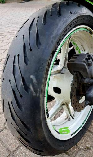 Green Kawasaki ER 2008 in Pasvalys, with an engine capacity of 0.65 L and mileage of 65 thousand km for 2050 €, photo 13 on AUTOMOTO.COM.LV