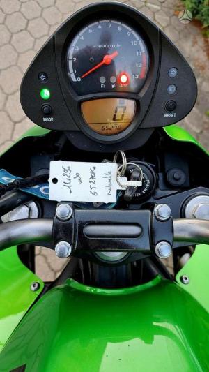 Green Kawasaki ER 2008 in Pasvalys, with an engine capacity of 0.65 L and mileage of 65 thousand km for 2050 €, photo 18 on AUTOMOTO.COM.LV