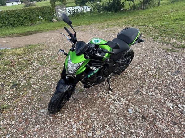 Green Kawasaki ER 2016 in Vilnius, with an engine capacity of 0.65 L and mileage of 40 thousand km for 4000 €, photo 2 on AUTOMOTO.COM.LV