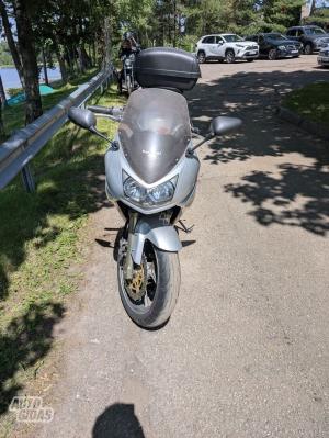 Grey Kawasaki ER 2006 in Vilnius, with an engine capacity of 0.65 L and mileage of 39 thousand km for 2400 €, photo 6 on AUTOMOTO.COM.LV