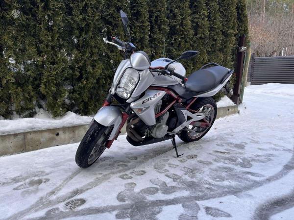 Grey Kawasaki ER 2006 in Kaunas, with an engine capacity of 0.65 L and mileage of 56 thousand km for 1650 €, photo 2 on AUTOMOTO.COM.LV