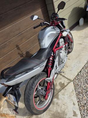 Grey Kawasaki ER 2006 in Pasvalys, with an engine capacity of 0.65 L and mileage of 60 thousand km for 1299 €, photo 7 on AUTOMOTO.COM.LV