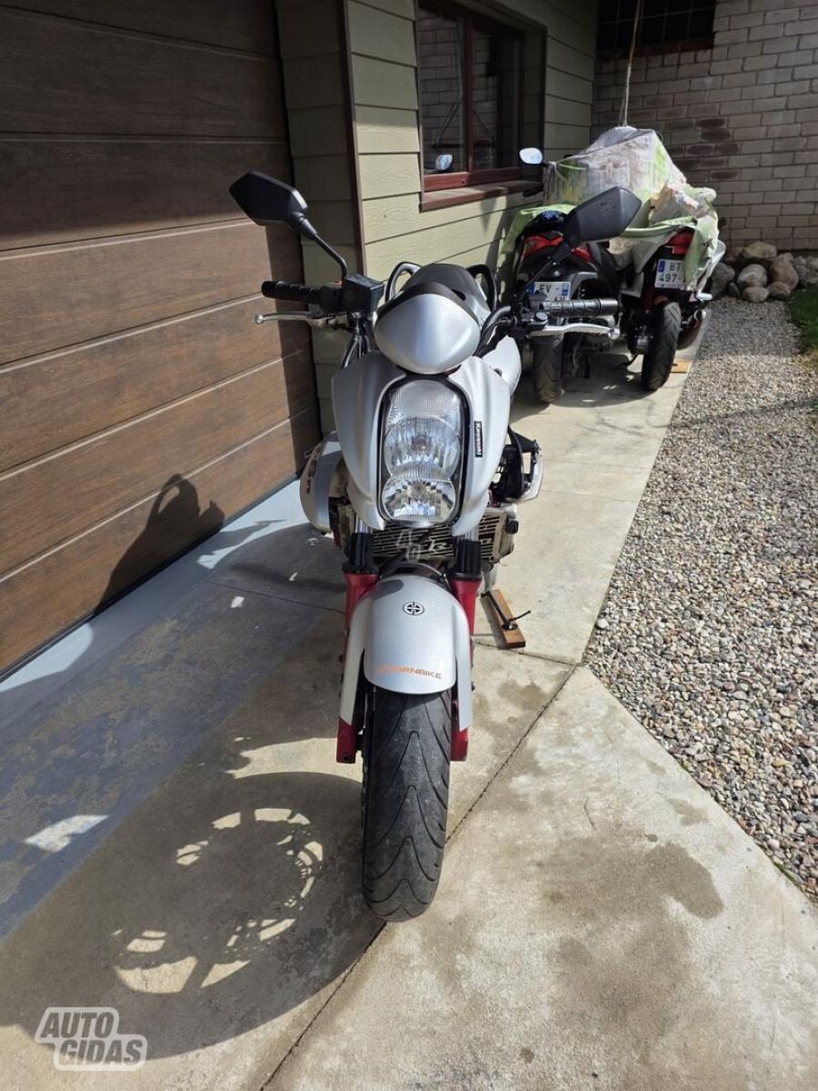 Grey Kawasaki ER 2006 in Pasvalys, with an engine capacity of 0.65 L and mileage of 60 thousand km for 1299 €, photo 10 on AUTOMOTO.COM.LV