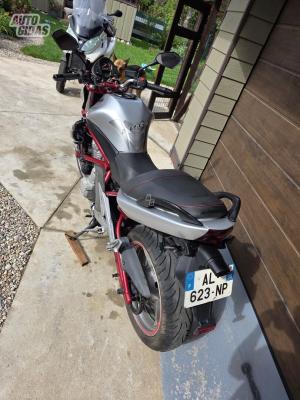 Grey Kawasaki ER 2006 in Pasvalys, with an engine capacity of 0.65 L and mileage of 60 thousand km for 1299 €, photo 12 on AUTOMOTO.COM.LV