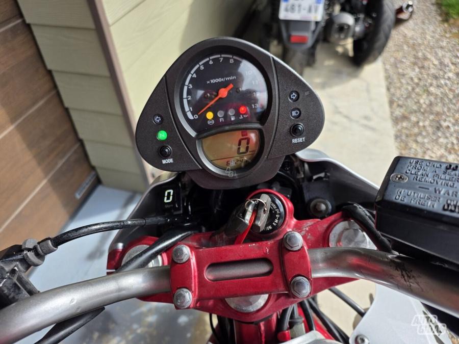 Grey Kawasaki ER 2006 in Pasvalys, with an engine capacity of 0.65 L and mileage of 60 thousand km for 1299 €, photo 15 on AUTOMOTO.COM.LV