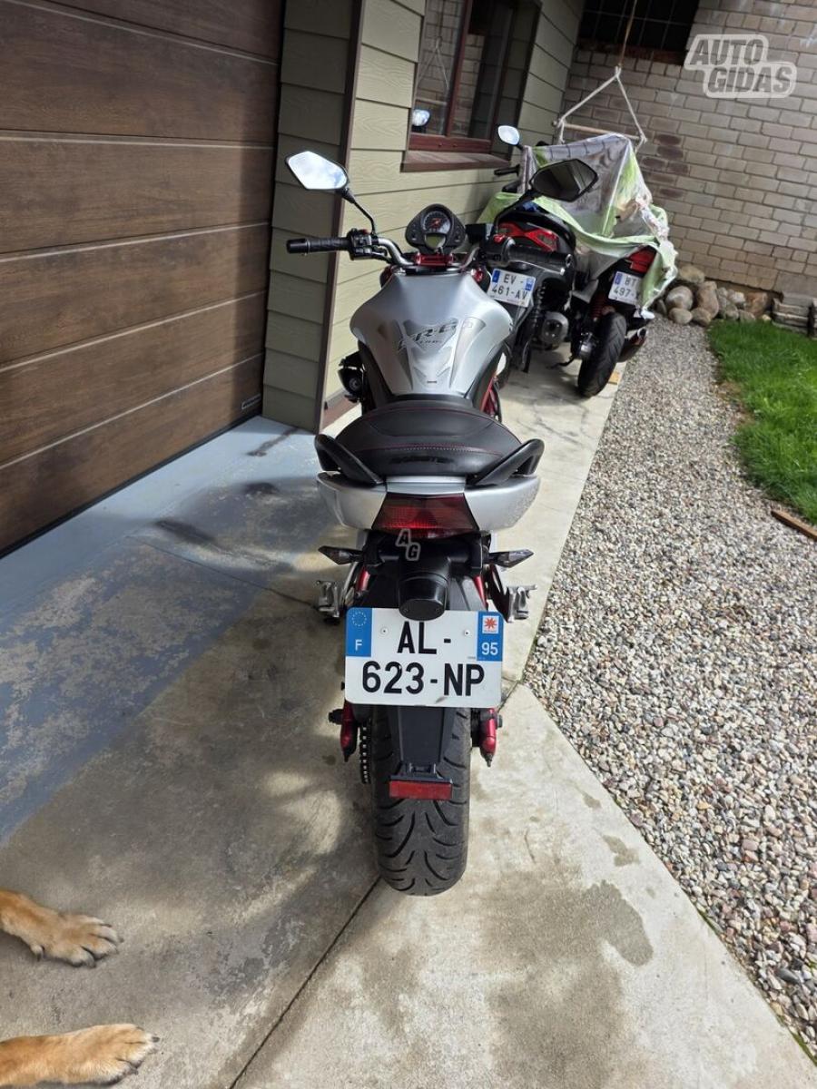 Grey Kawasaki ER 2006 in Pasvalys, with an engine capacity of 0.65 L and mileage of 60 thousand km for 1299 €, photo 17 on AUTOMOTO.COM.LV
