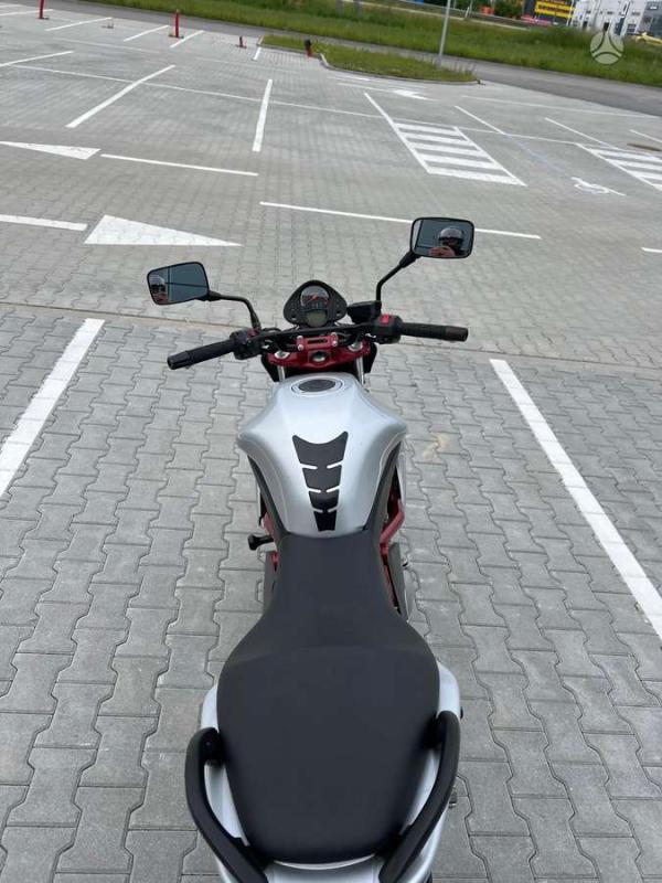 Pelēks Kawasaki ER 2006 Klaipėda, ar dzinēja tilpumu 0.65 L un nobraukumu 24 tūkst. km par 2000 €, foto 6 vietnē AUTOMOTO.COM.LV