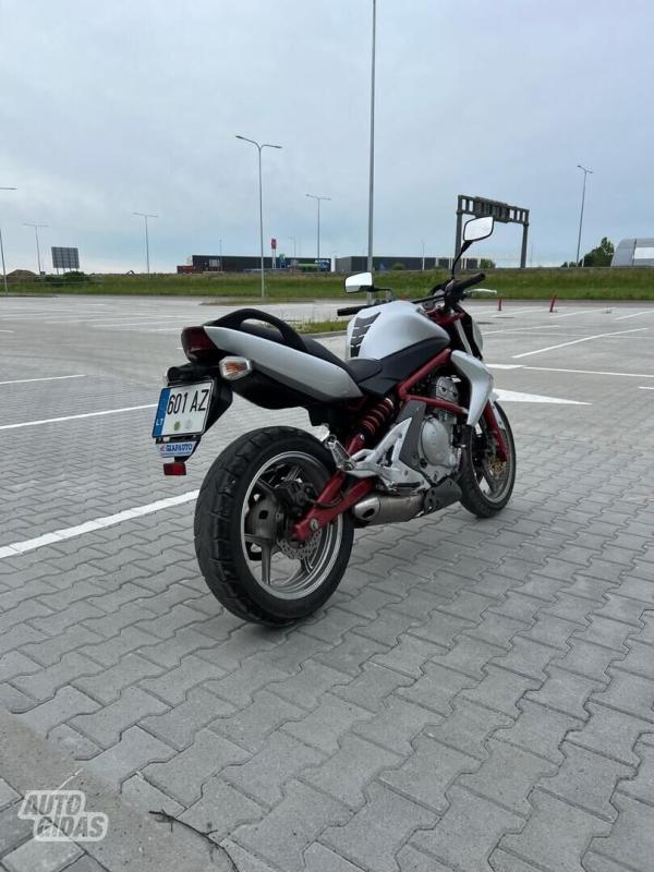 Pelēks Kawasaki ER 2006 Klaipėda, ar dzinēja tilpumu 0.65 L un nobraukumu 24 tūkst. km par 1600 €, foto 6 vietnē AUTOMOTO.COM.LV