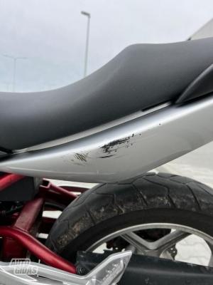 Grey Kawasaki ER 2006 in Klaipeda, with an engine capacity of 0.65 L and mileage of 24 thousand km for 1600 €, photo 12 on AUTOMOTO.COM.LV