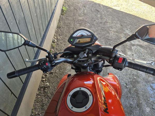 Orange Kawasaki ER 2010 in Kursenai, with an engine capacity of 0.65 L and mileage of 43 thousand km for 2599 €, photo 11 on AUTOMOTO.COM.LV