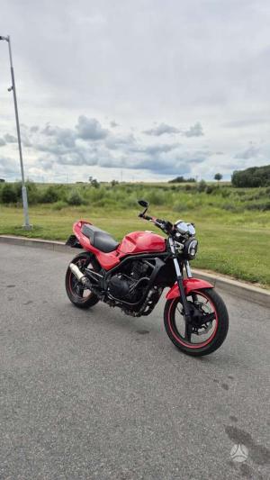 Red Kawasaki ER 1999 in Ukmerge, with an engine capacity of 0.50 L and mileage of 300 thousand km for 1650 €, photo  on AUTOMOTO.COM.LV