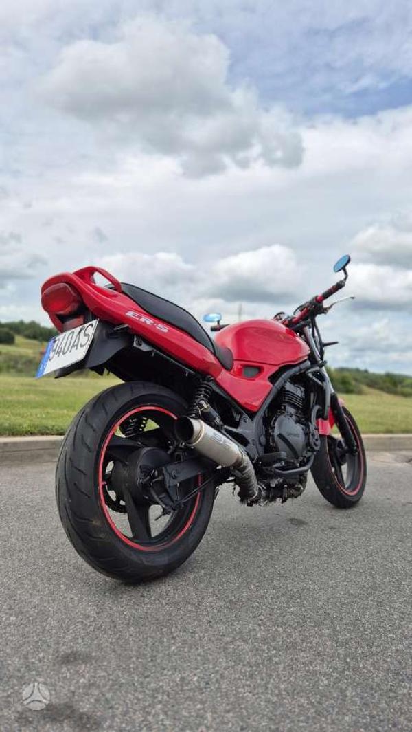 Red Kawasaki ER 1999 in Ukmerge, with an engine capacity of 0.50 L and mileage of 300 thousand km for 1650 €, photo 7 on AUTOMOTO.COM.LV