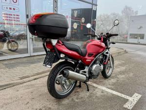 Red Kawasaki ER 2001 in Vilnius, with an engine capacity of 0.50 L and mileage of 35 thousand km for 1499 €, photo 8 on AUTOMOTO.COM.LV