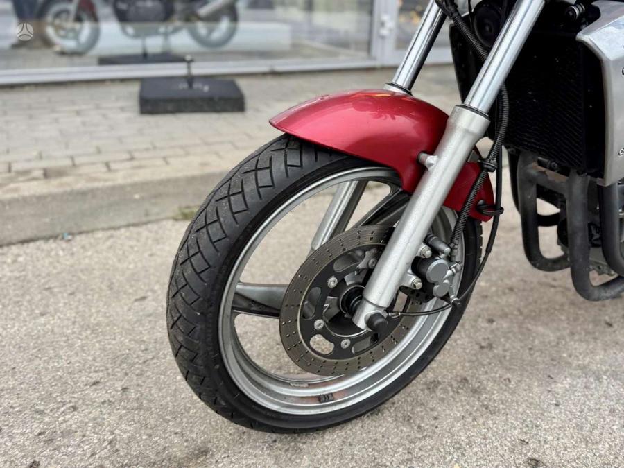 Red Kawasaki ER 2001 in Vilnius, with an engine capacity of 0.50 L and mileage of 35 thousand km for 1499 €, photo 16 on AUTOMOTO.COM.LV