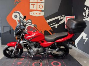 Sarkans Kawasaki ER 2004 Viļņa, ar dzinēja tilpumu 0.50 L un nobraukumu 42 tūkst. km par 1699 €, foto 3 vietnē AUTOMOTO.COM.LV