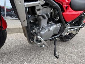 Sarkans Kawasaki ER 2004 Viļņa, ar dzinēja tilpumu 0.50 L un nobraukumu 42 tūkst. km par 1699 €, foto 12 vietnē AUTOMOTO.COM.LV