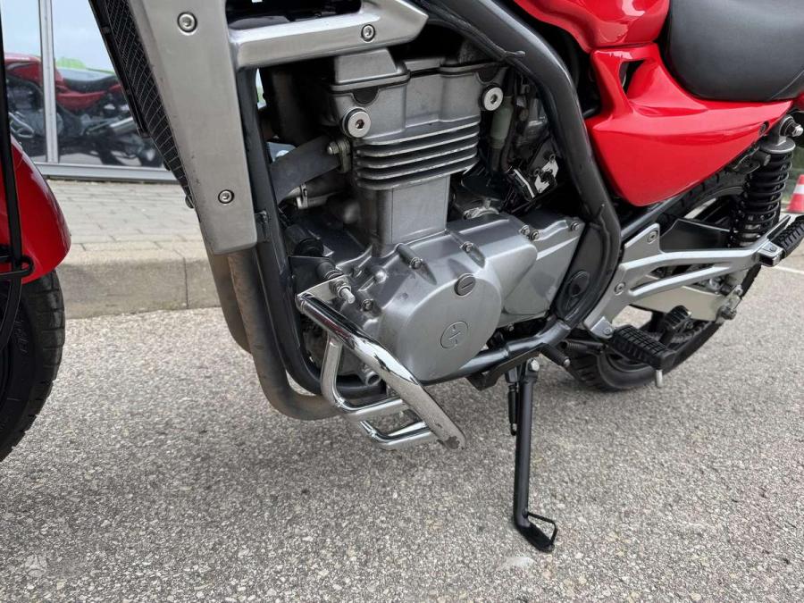 Sarkans Kawasaki ER 2004 Viļņa, ar dzinēja tilpumu 0.50 L un nobraukumu 42 tūkst. km par 1699 €, foto 12 vietnē AUTOMOTO.COM.LV