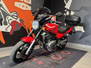 Sarkans Kawasaki ER 2004 Viļņa, ar dzinēja tilpumu 0.50 L un nobraukumu 42 tūkst. km par 1699 €, foto 14 vietnē AUTOMOTO.COM.LV