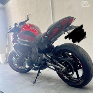 Red Kawasaki ER 2013 in Jonava, with an engine capacity of 0.65 L and mileage of 20 thousand km for 3600 €, photo 1 on AUTOMOTO.COM.LV