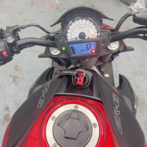 Red Kawasaki ER 2013 in Jonava, with an engine capacity of 0.65 L and mileage of 20 thousand km for 3600 €, photo 4 on AUTOMOTO.COM.LV