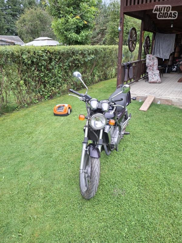 Violet Kawasaki ER 2003 in Kaunas, with an engine capacity of 0.50 L and mileage of 15 thousand km for 1600 €, photo 2 on AUTOMOTO.COM.LV