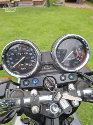 Violet Kawasaki ER 2003 in Kaunas, with an engine capacity of 0.50 L and mileage of 15 thousand km for 1600 €, photo 6 on AUTOMOTO.COM.LV