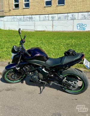 Violets Kawasaki ER 2010 Viļņa, ar dzinēja tilpumu 0.65 L un nobraukumu 60 tūkst. km par 2400 €, foto  vietnē AUTOMOTO.COM.LV