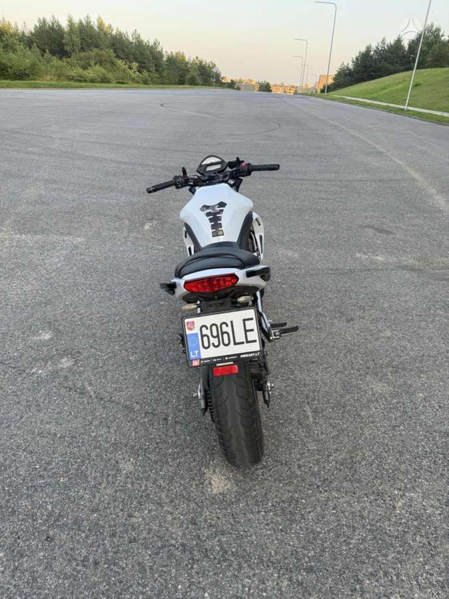 White Kawasaki ER 2009 in Alytus, with an engine capacity of 0.65 L and mileage of 32 thousand km for 3100 €, photo 7 on AUTOMOTO.COM.LV