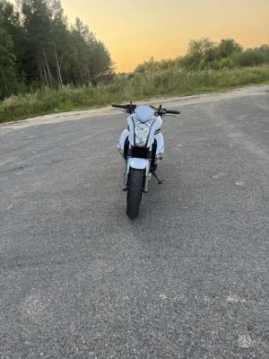 White Kawasaki ER 2009 in Alytus, with an engine capacity of 0.65 L and mileage of 32 thousand km for 3100 €, photo 11 on AUTOMOTO.COM.LV