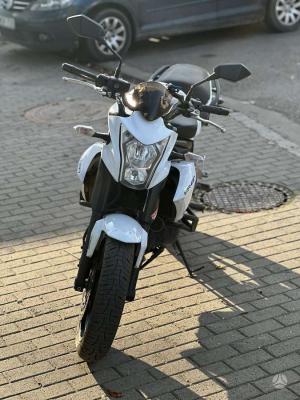White Kawasaki ER 2012 in Vilnius, with an engine capacity of 0.65 L and mileage of 38 thousand km for 3500 €, photo 3 on AUTOMOTO.COM.LV